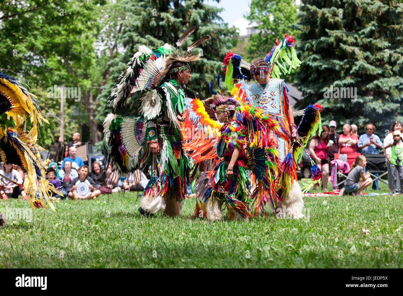 Members of Canada's First Nations communities celebrate and dance ...