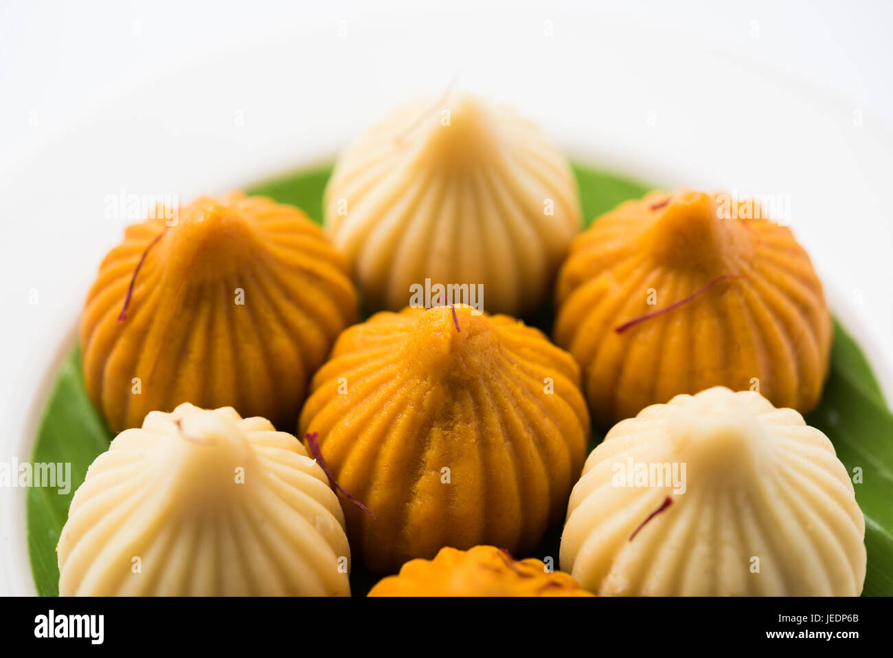 A modak is an Indian sweet dumpling popular in India. It is called ...