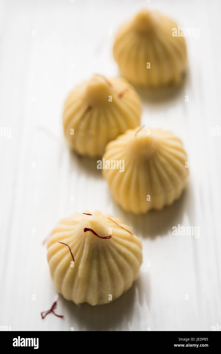 A modak is an Indian sweet dumpling popular in India. It is called ...