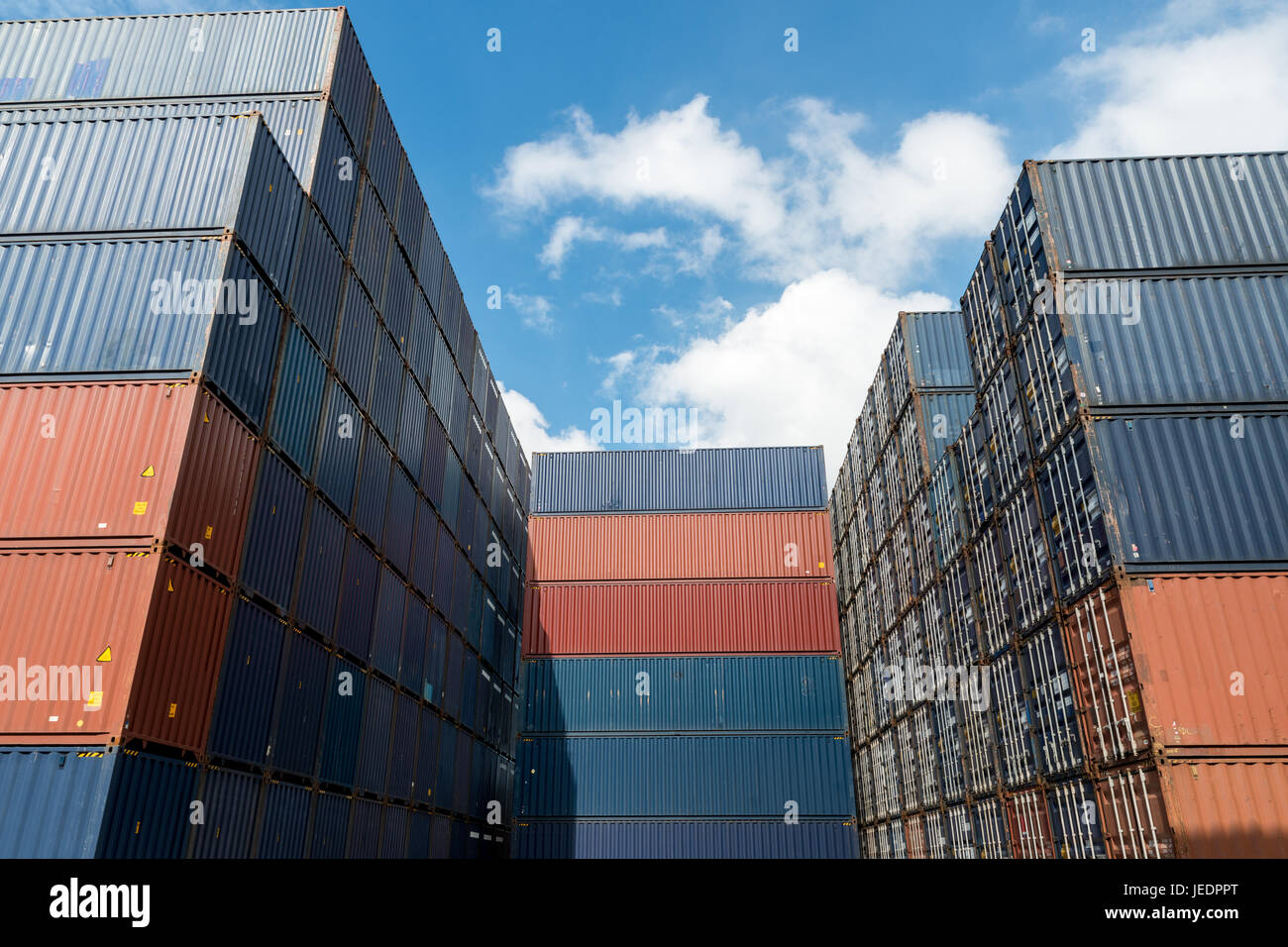 Stack of cargo containers at import and export area at port Stock Photo ...