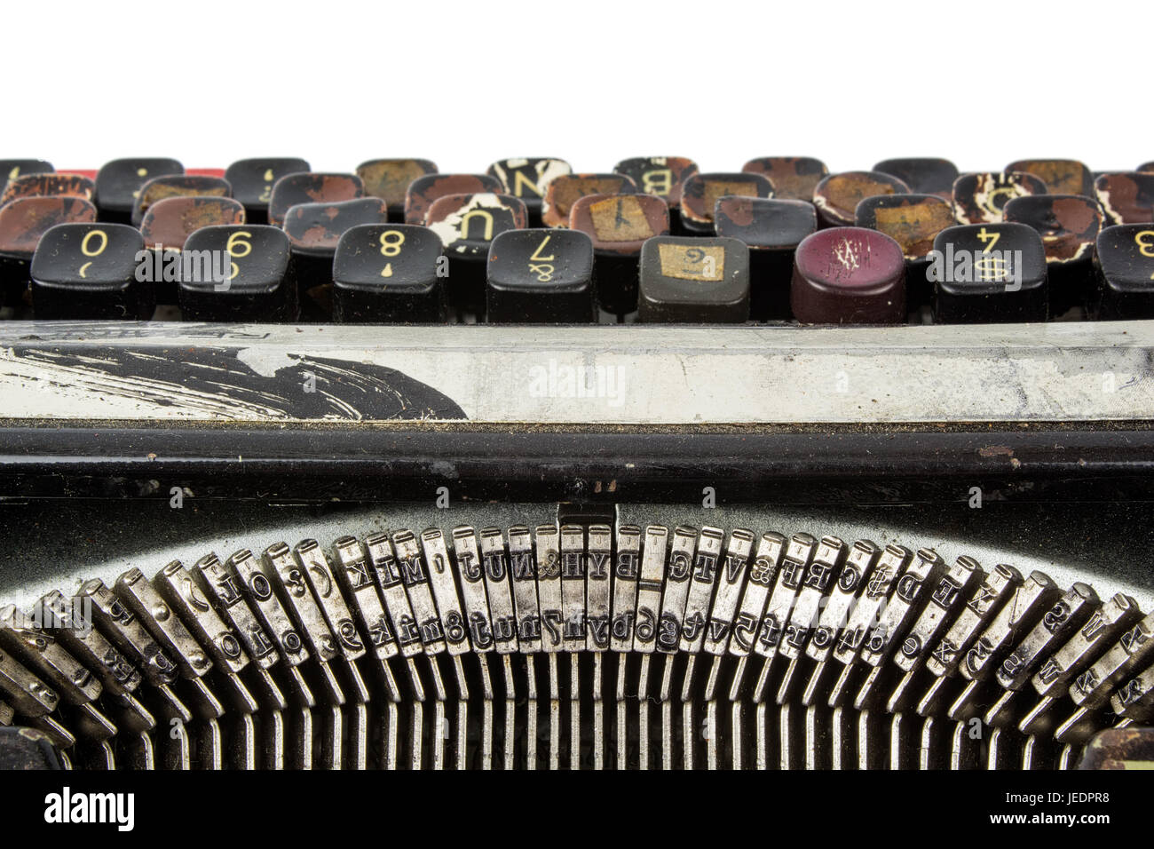 old and rusty dirty typewriter. viewed from the botton. They displayed ...