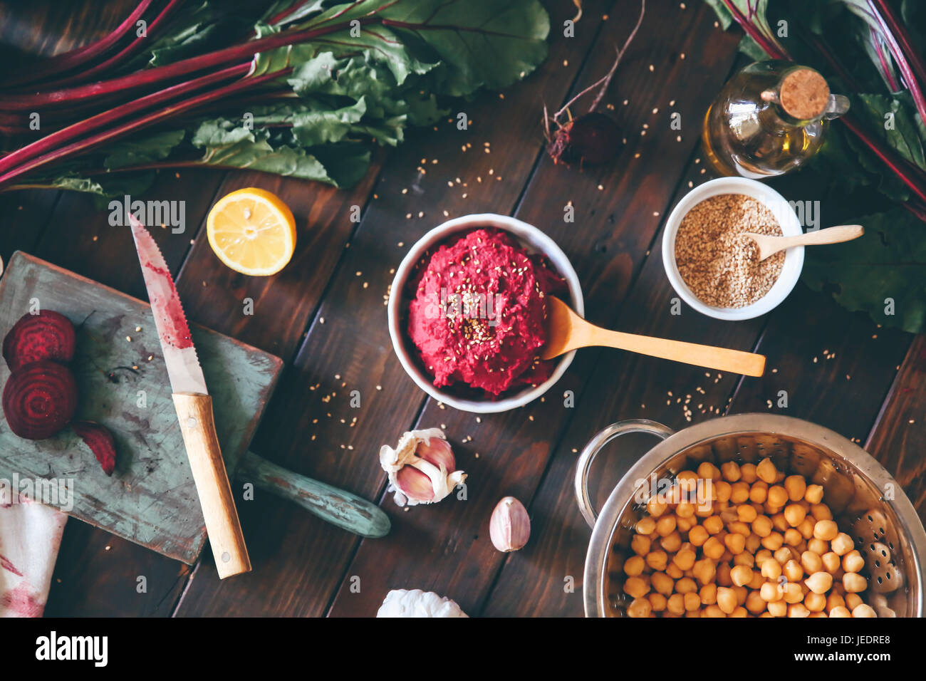 Bowl of Beetroot Hummus and ingredients on wood Stock Photo - Alamy