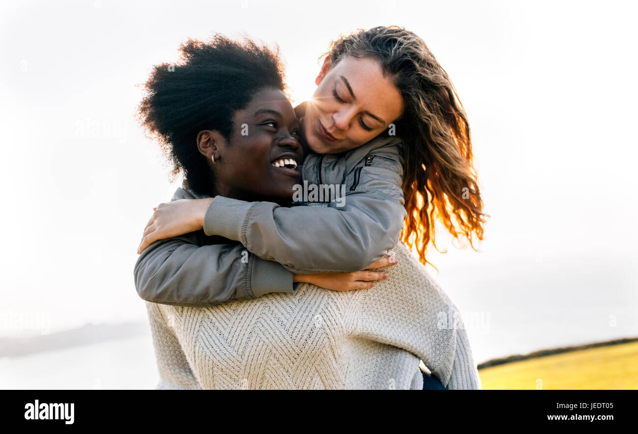 Two best friends having fun outdoors Stock Photo - Alamy