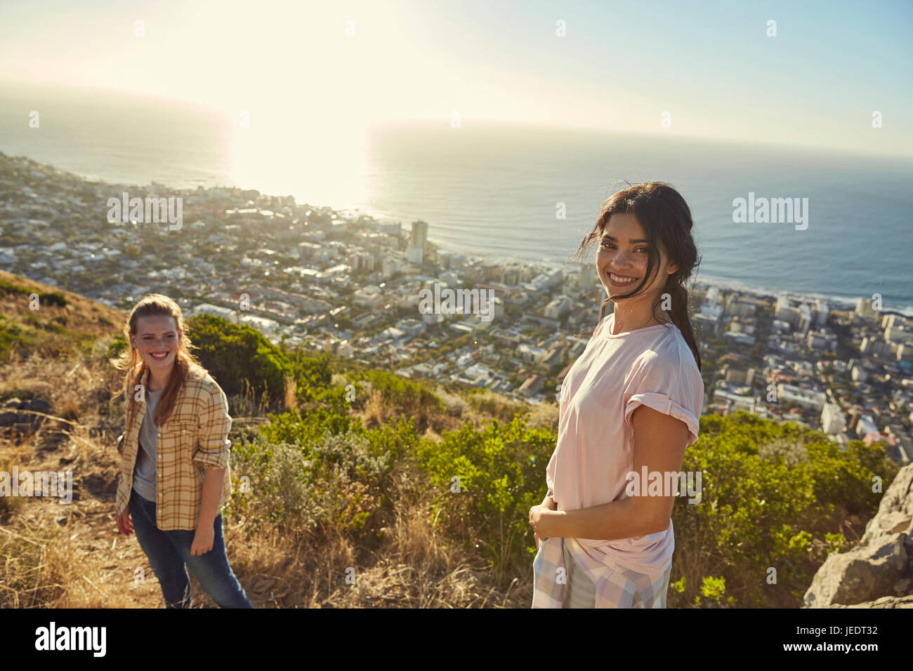 South Africa, Cape Town, Signal Hill, two young women hiking above the ...