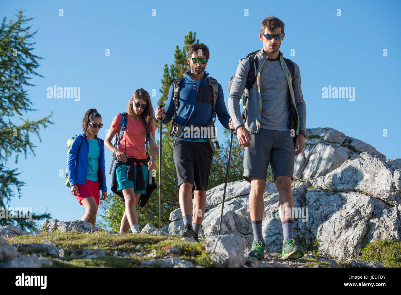 Italy, Friends trekking in the Dolomtes Stock Photo - Alamy