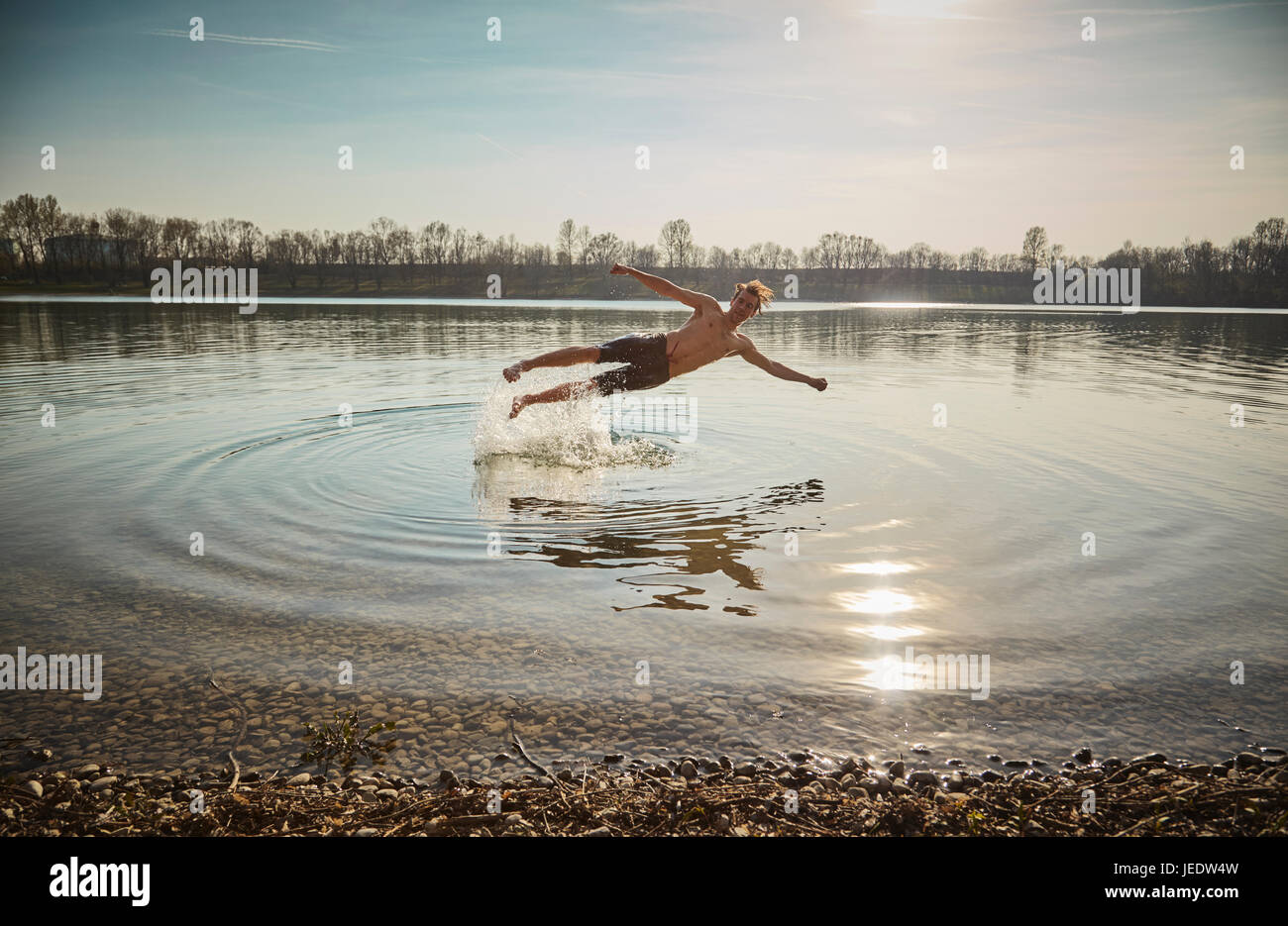 Full length jump water splash hi-res stock photography and images - Alamy