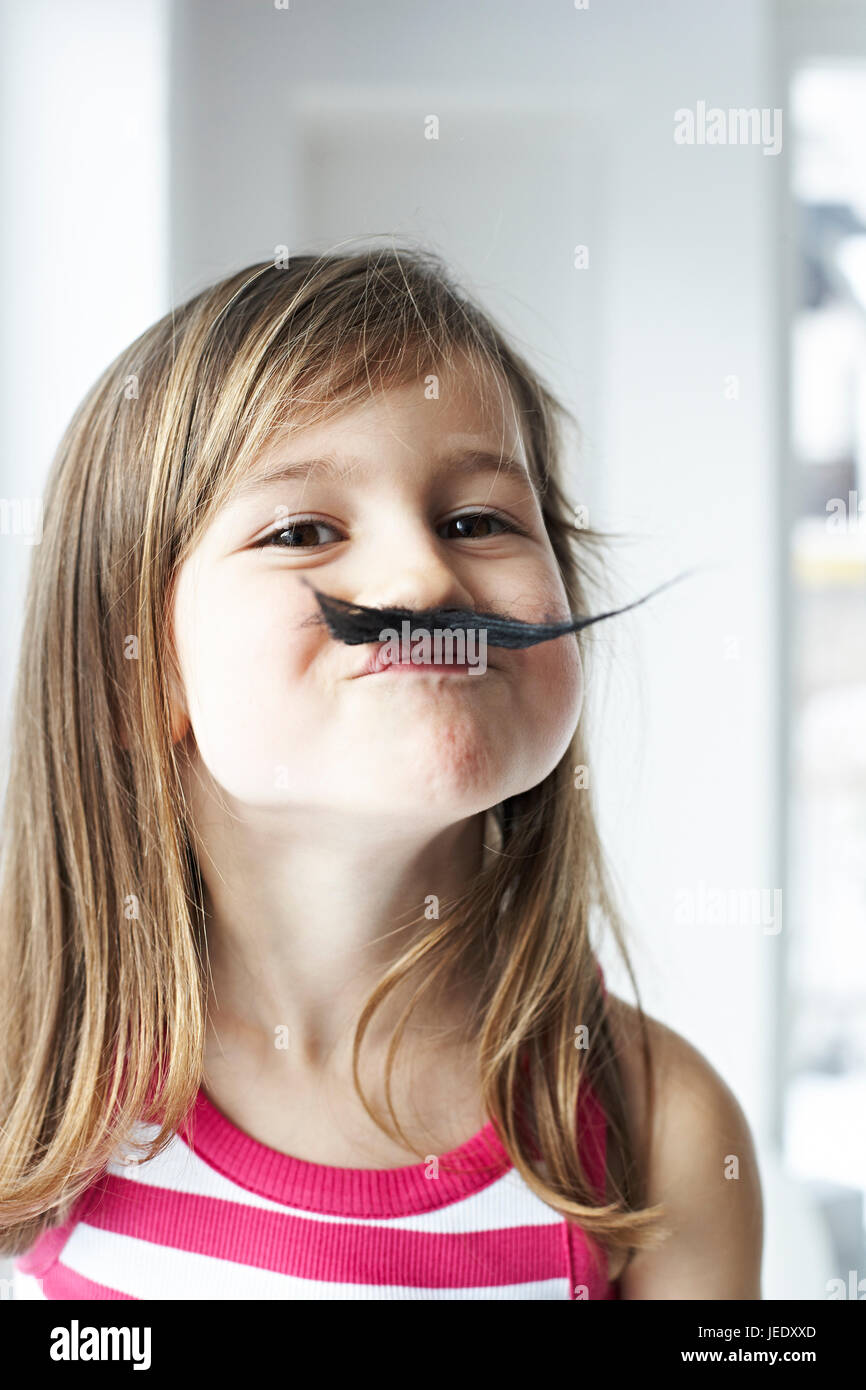 Portrait of smiling little girl with moustache Stock Photo - Alamy