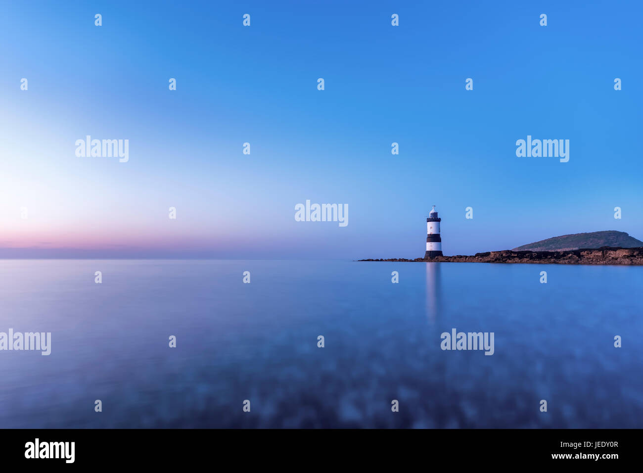 Trywn Du Lighthouse (Penmon Lighthouse), with Puffin Island in the ...