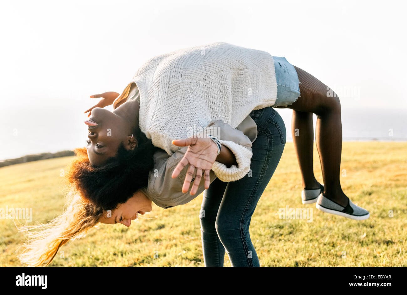 Two best friends having fun outdoors Stock Photo - Alamy
