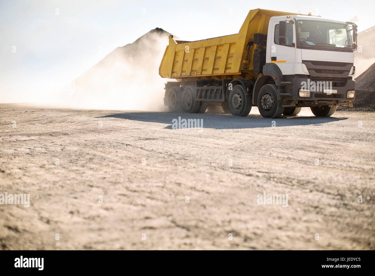 Dump truck at quarry Stock Photo - Alamy