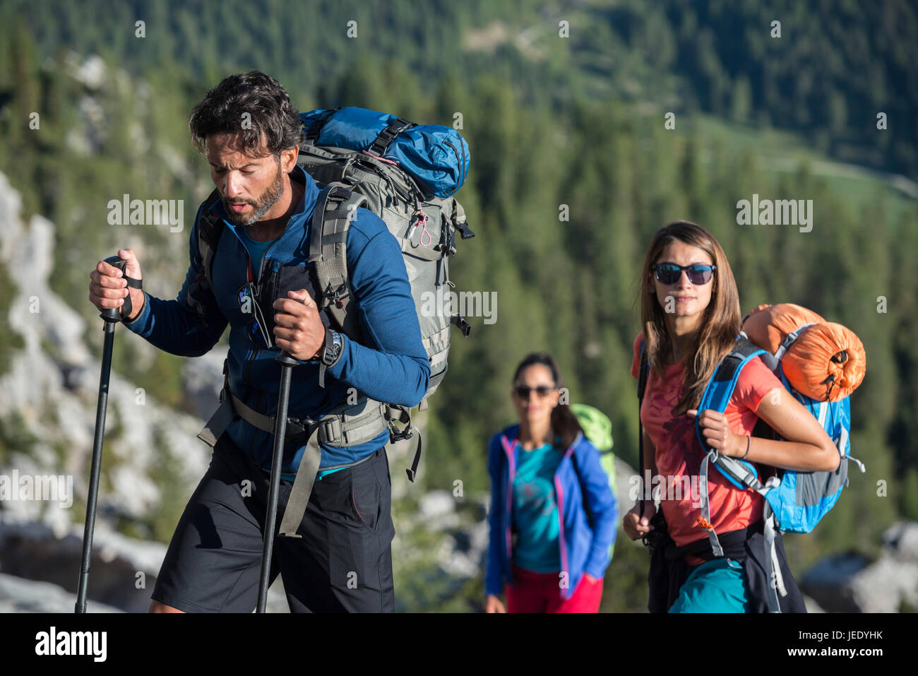 Italy, Friends trekking in the Dolomtes Stock Photo - Alamy