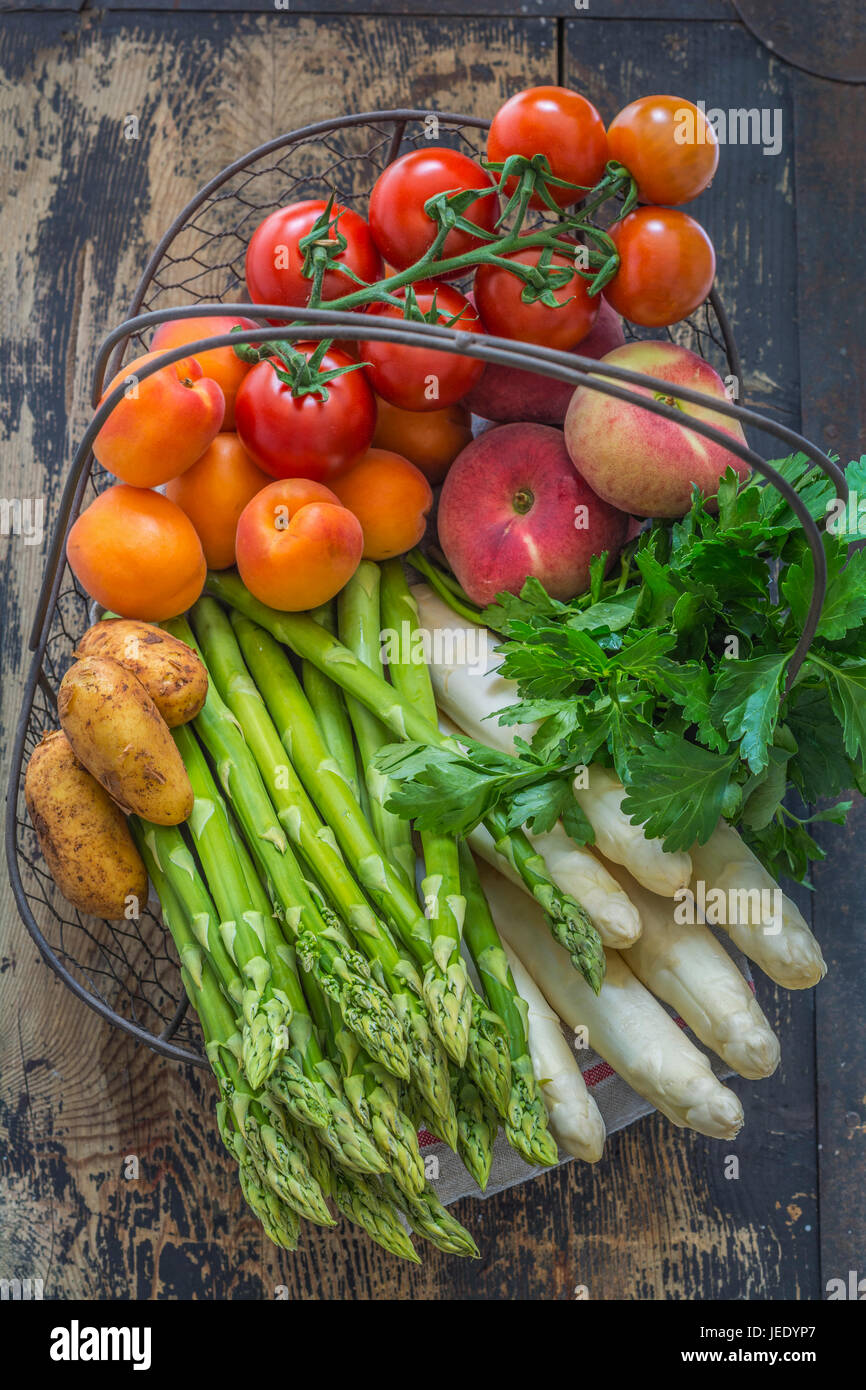 Wire basket of various fruits and vegetables Stock Photo - Alamy