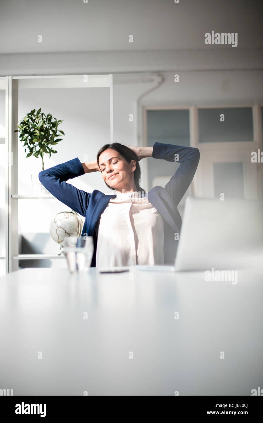 Sitting leaning back daydreaming hi-res stock photography and images ...