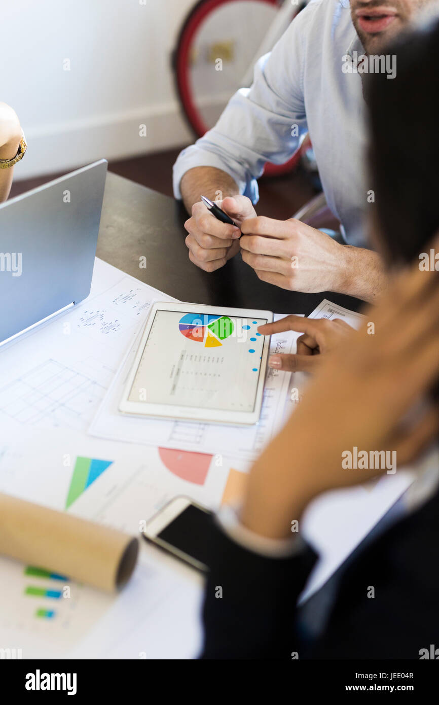 Business people analyzing data in office Stock Photo - Alamy