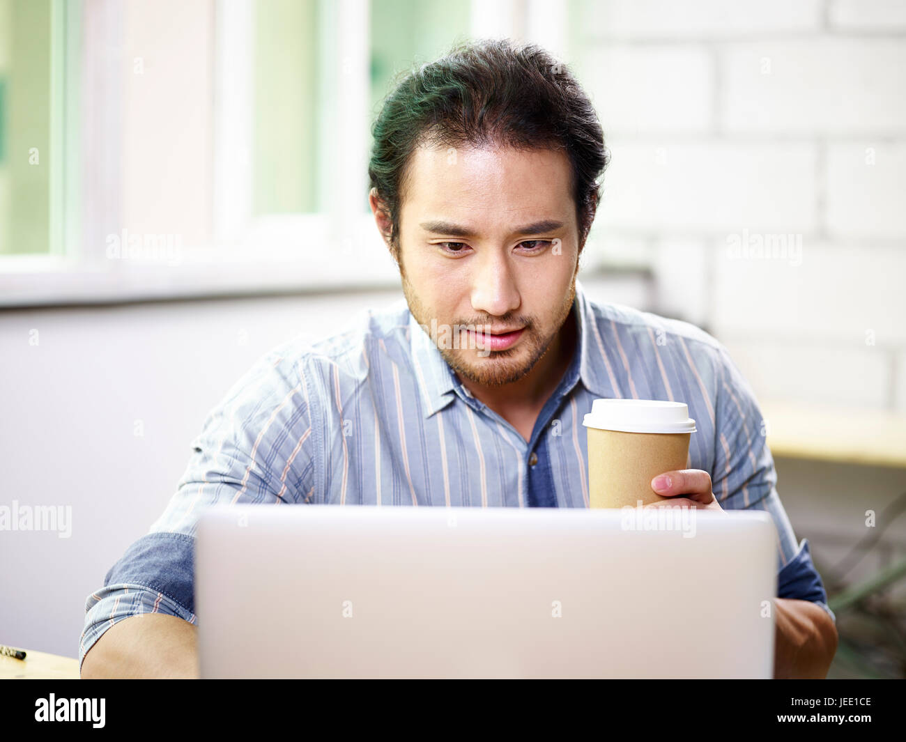 Businessman office desk laptop hi-res stock photography and images - Alamy