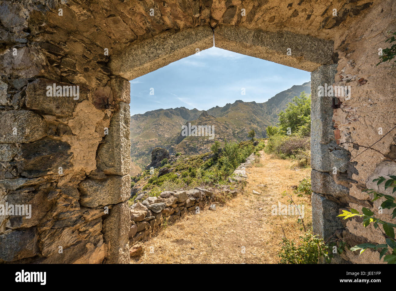Stone entrance to "La maison du bandit", the bandit's house, above the ...