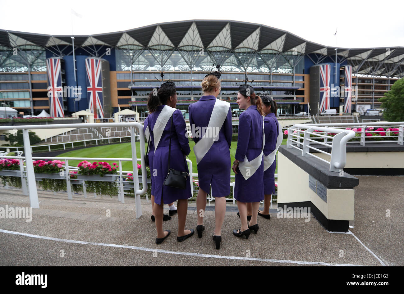 Ascot information guides gather together outside the parade ring before ...