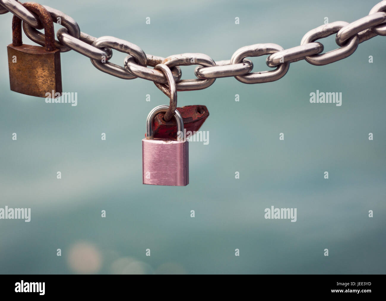 Chain with locks hi-res stock photography and images - Alamy