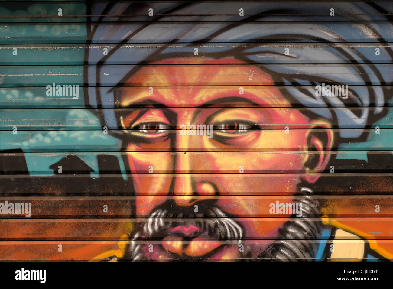 A painted closed shutters of a shop depicting a medieval Sephardic ...