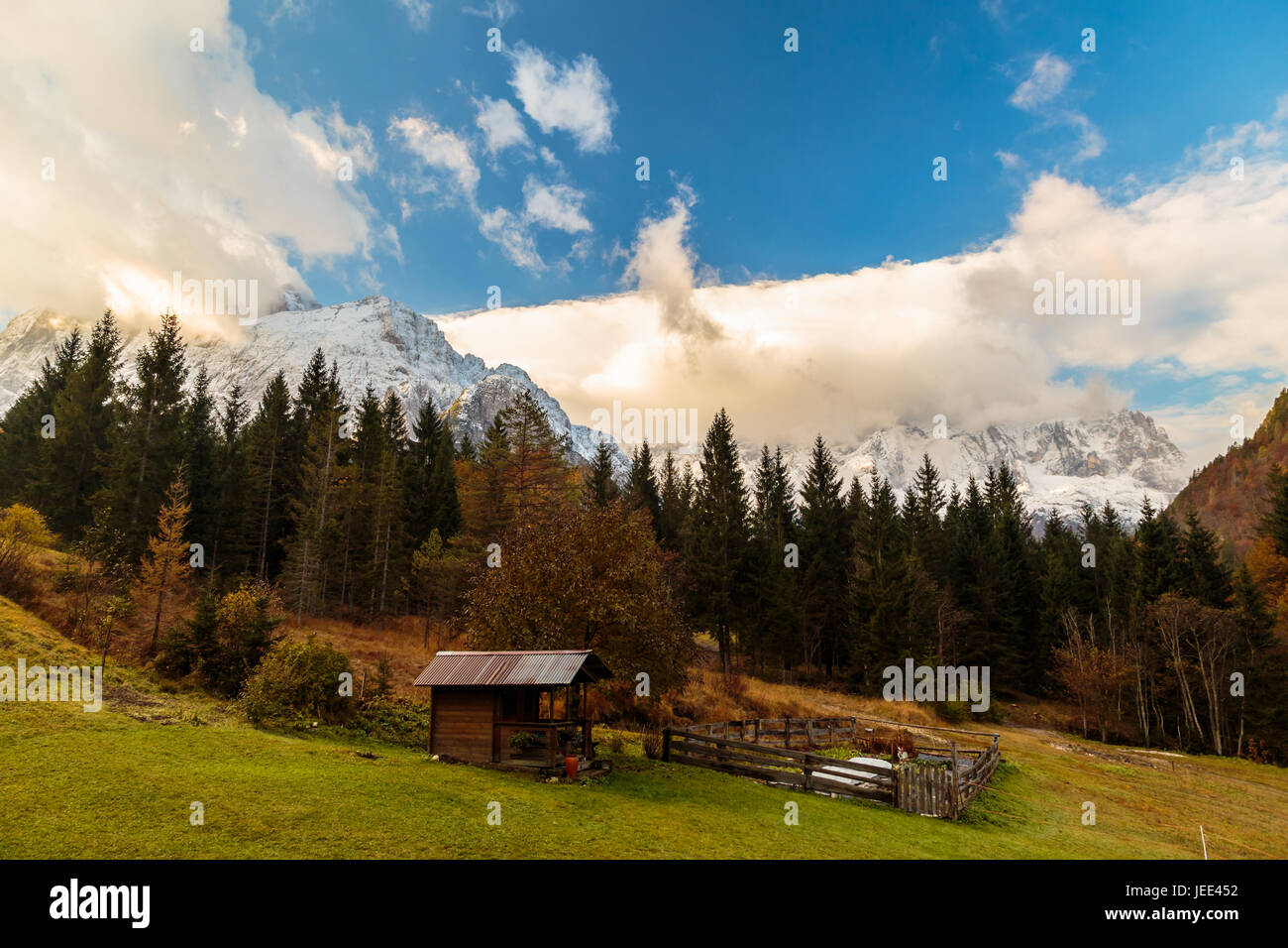 an alpine hut in the valley during a colorful sunrise Stock Photo - Alamy