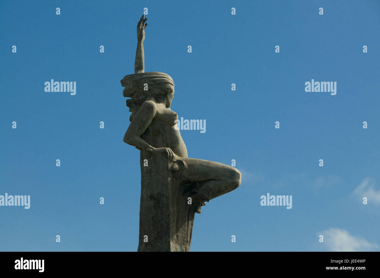 Statue of a woman, upraised arm, blue sky, Funchal, Madeira Stock Photo ...