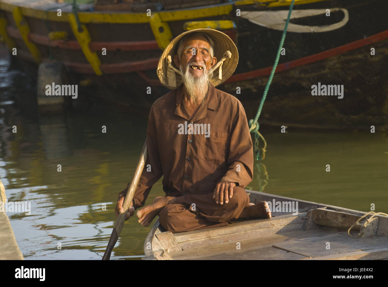 Old man in boat hi-res stock photography and images - Alamy