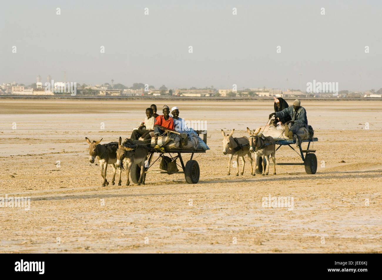 Donkey carts, Sand runway, background town, Saloum delta, Senegal Stock ...