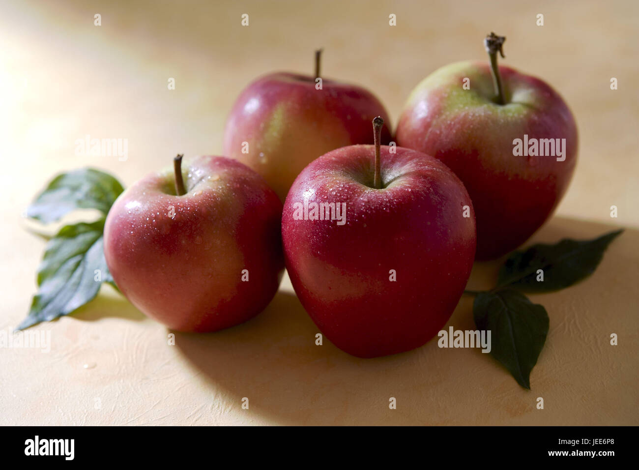 four red apples Stock Photo - Alamy