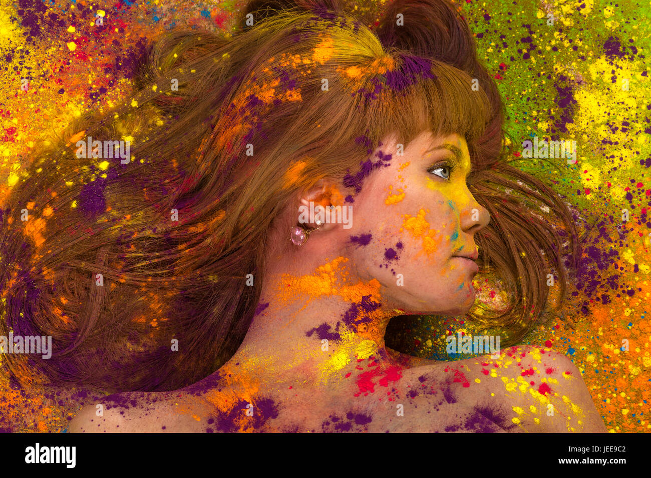 colorful artistic portrait woman in paint Stock Photo - Alamy
