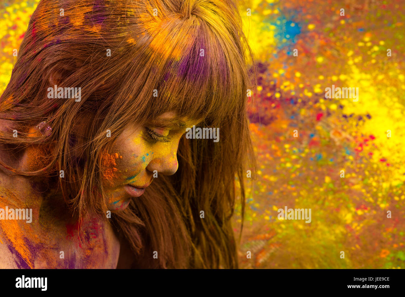 woman face in colors closeup Stock Photo - Alamy