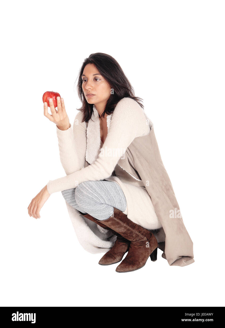 Pretty woman crouching on floor Cut Out Stock Images & Pictures - Alamy