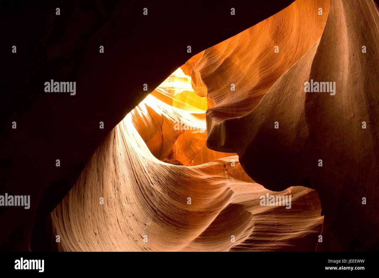 Antelope Canyon canyon curves. Sunlight shining through the curved ...