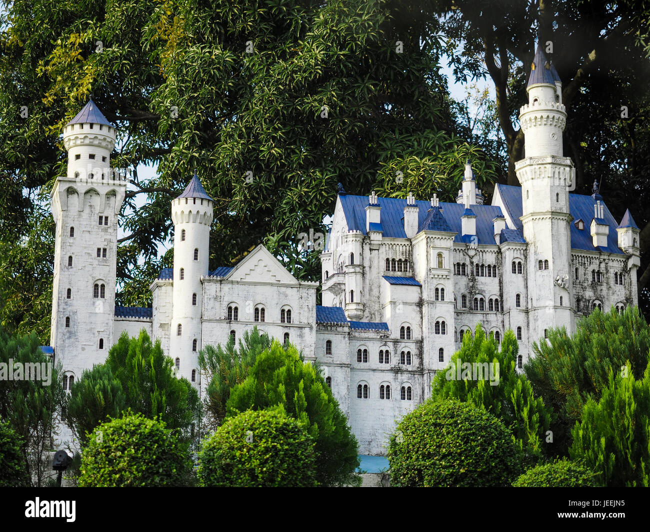 Miniature model of Neuschwanstein castle in forest Stock Photo - Alamy