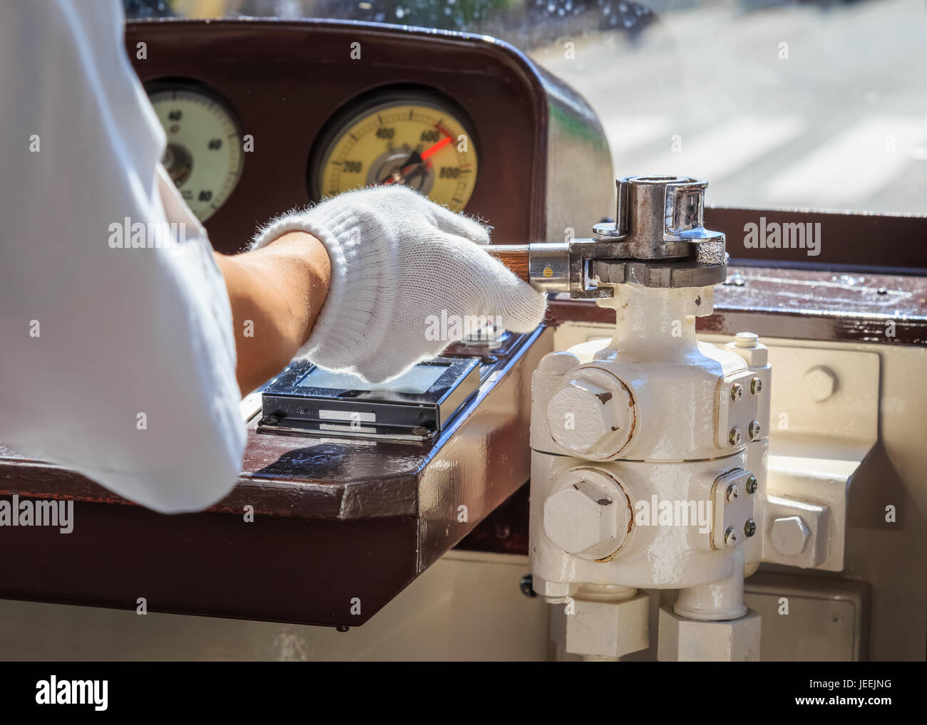 Close up of a hand of a japanese Tram Driver Stock Photo - Alamy