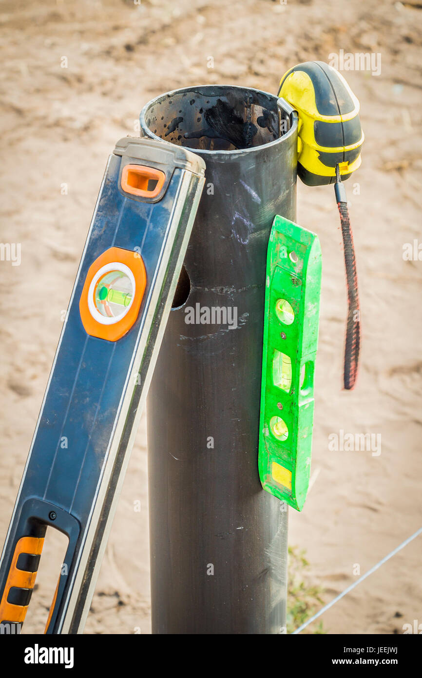 Measuring tools on site during rest Stock Photo - Alamy