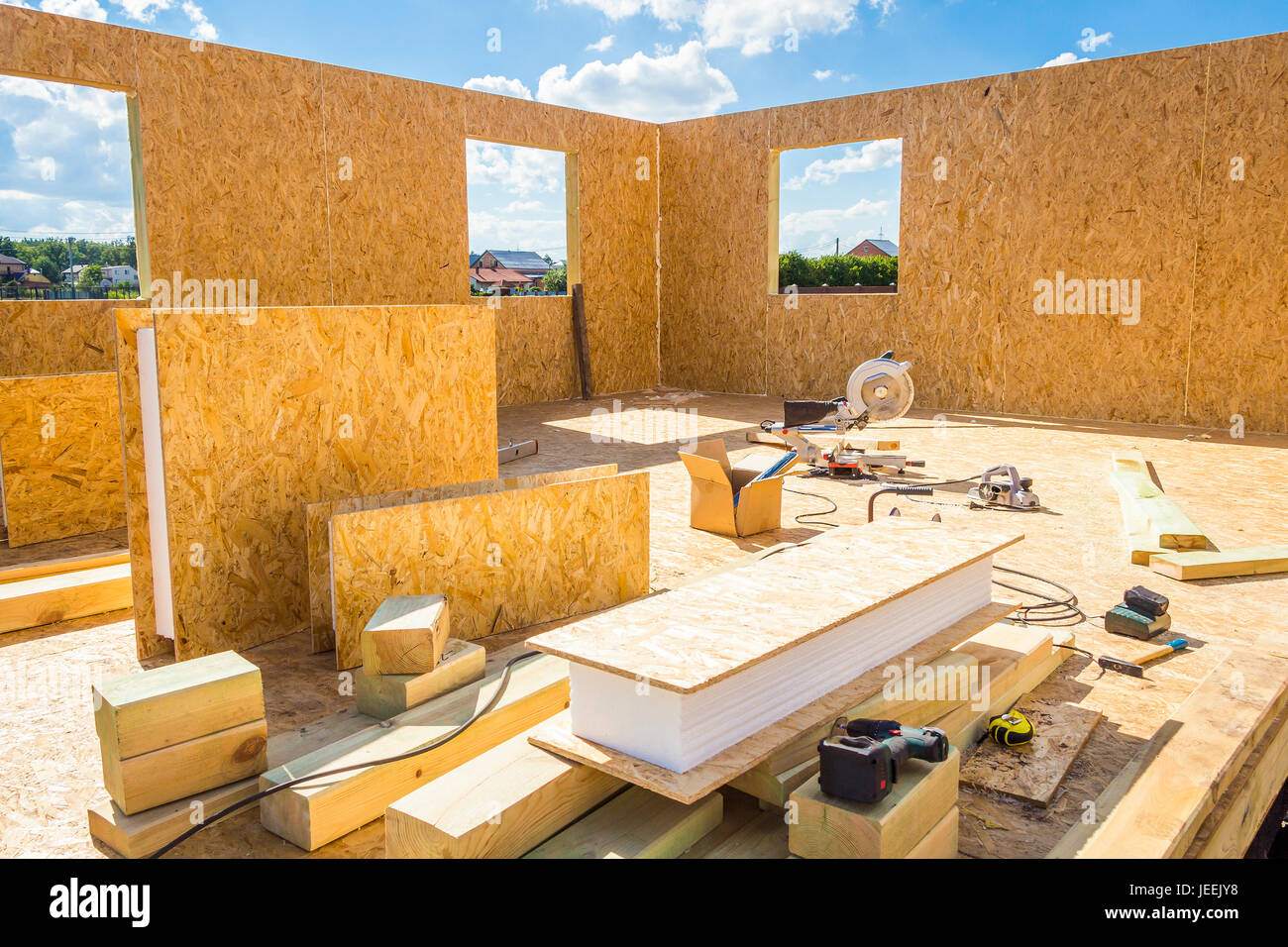 Assembling a small house of SIP panels Stock Photo - Alamy