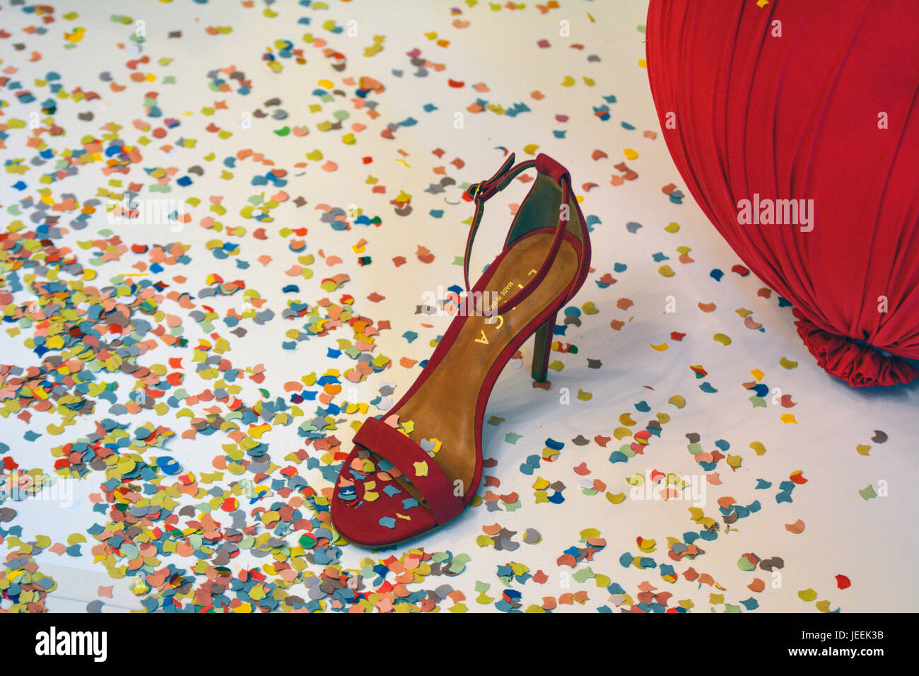A fashion photograph of a show of a Romanian brand and a red balloon ...