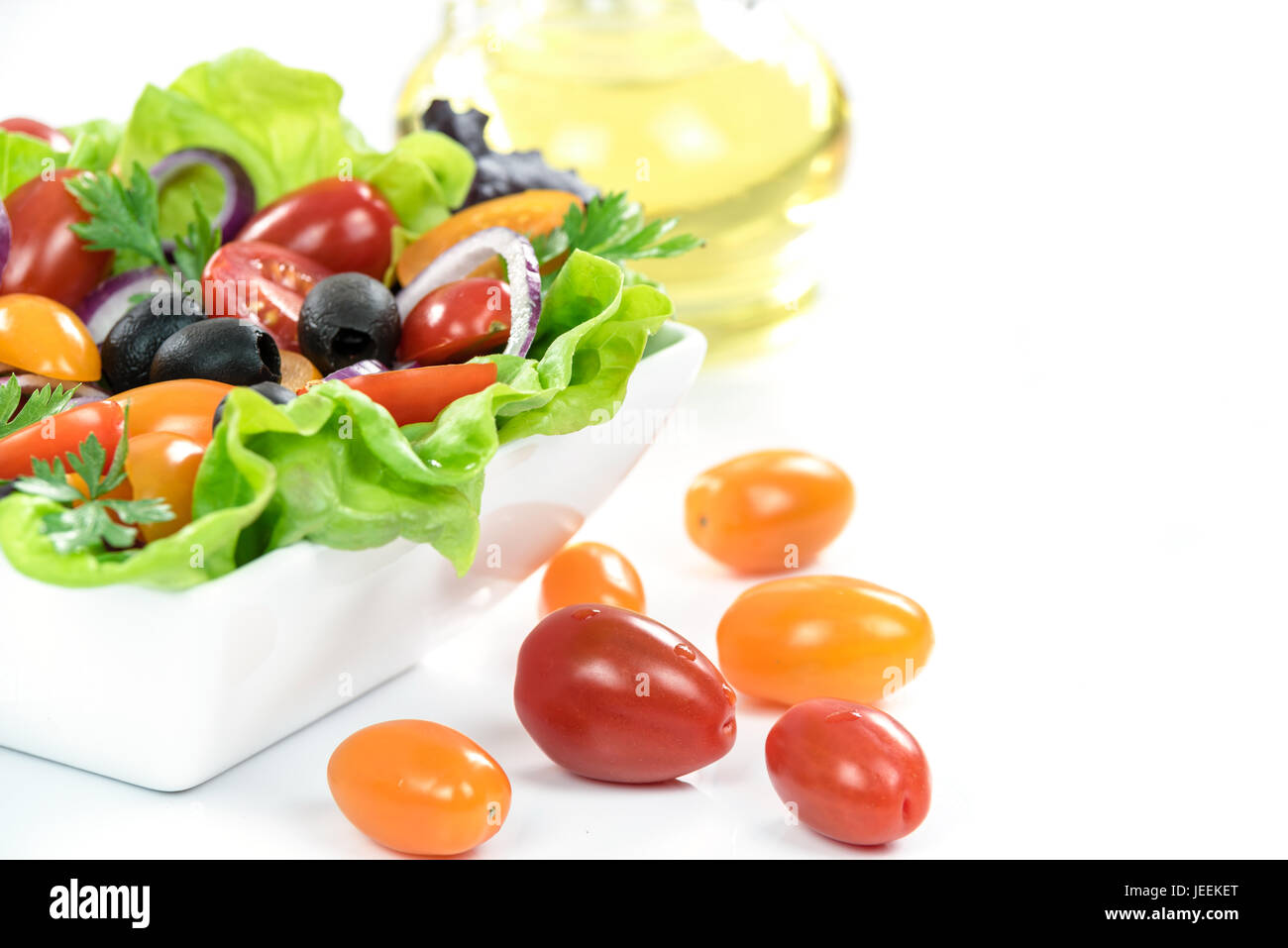 Ingredients of healthy vegetable lettuce - lettuce, olive oil, olives ...