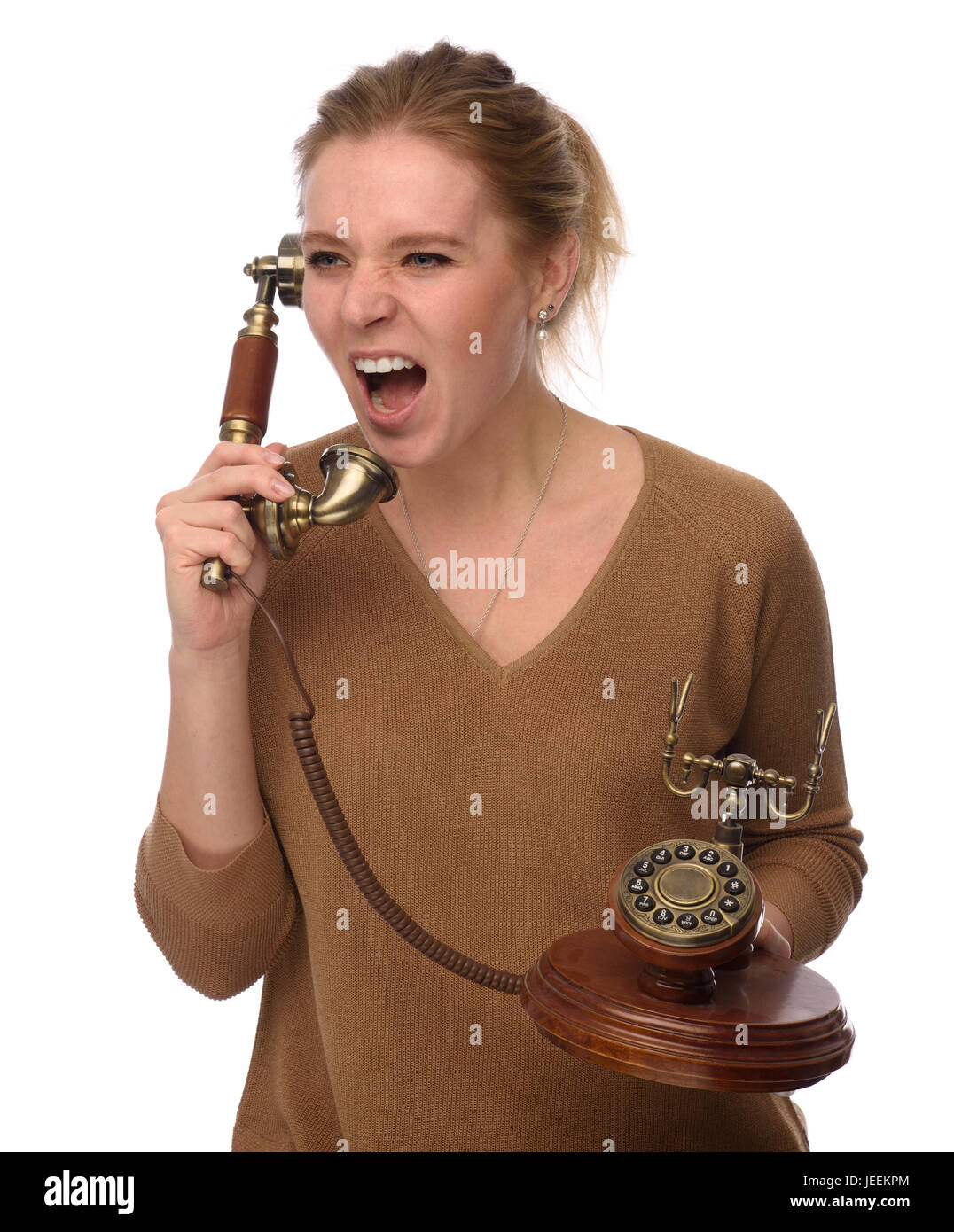 Angry woman on the phone isolated on white background Stock Photo - Alamy