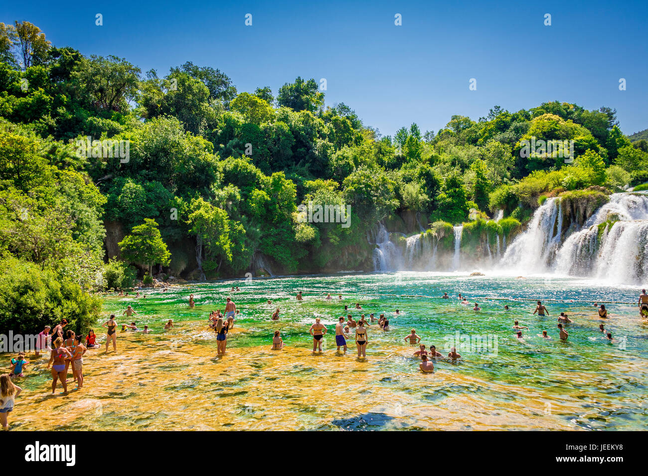 A couple swim below the Skradinski buk waterfall at Krka National Park in Croatia Stock Photo ...