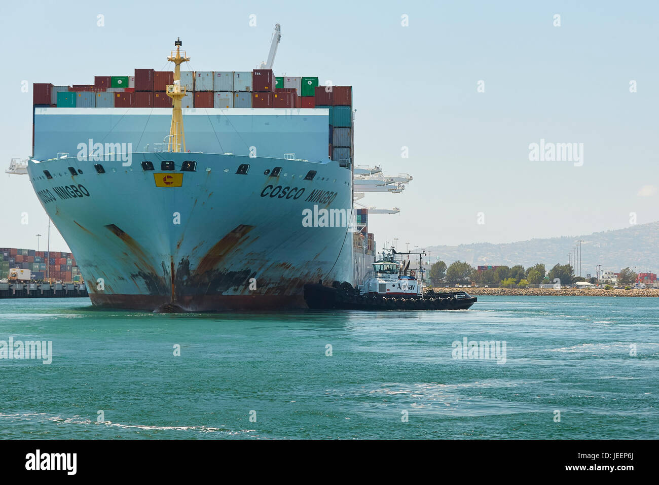 The Giant COSCO Ningbo Container Ship Is Guided Into Berth J270 On Pier ...