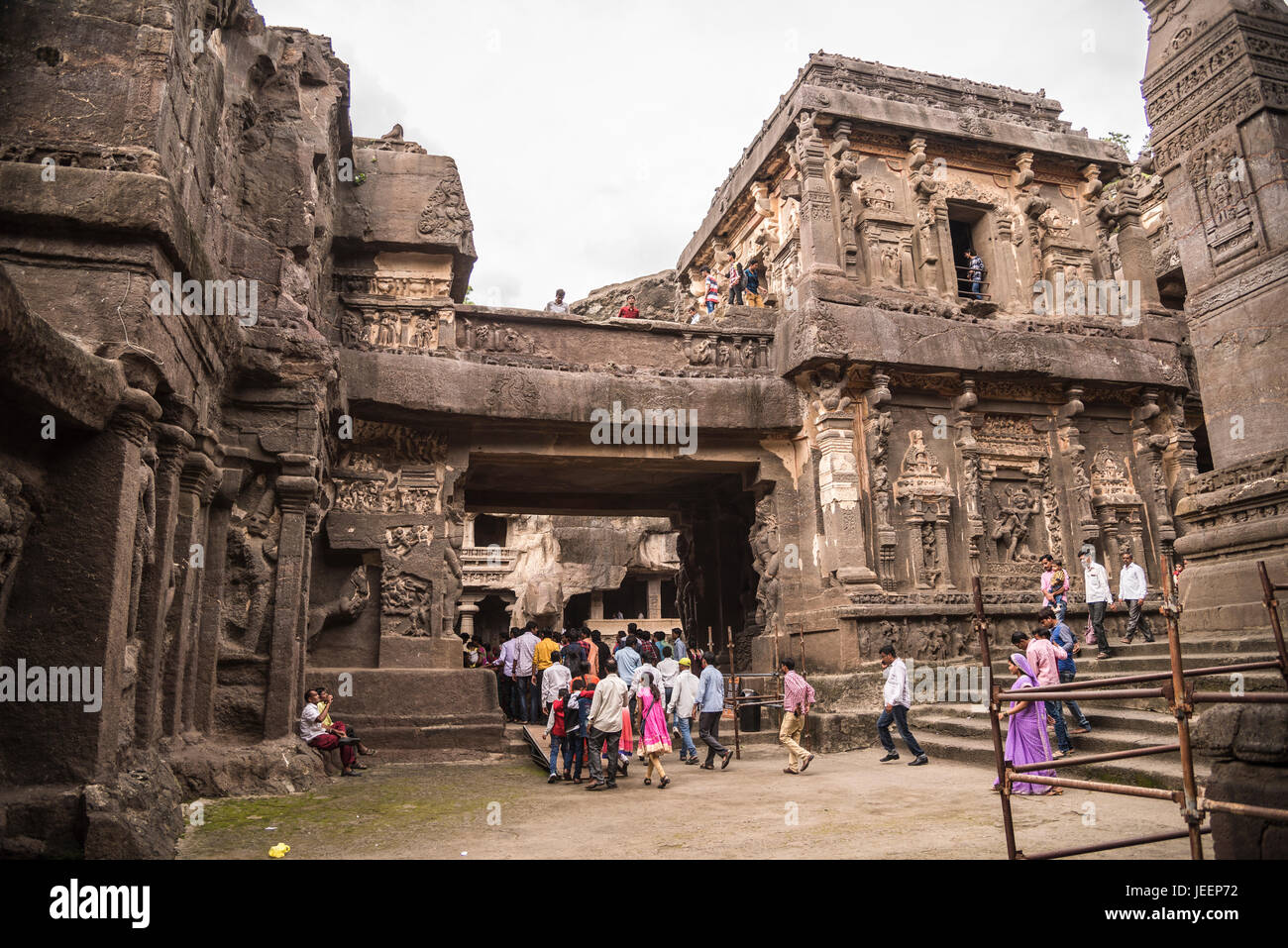 People visiting to the caves in Ellora, Maharashtra state in India ...
