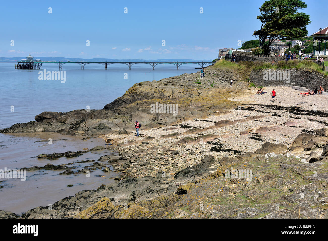 Clevedon pebble beach, North Somerset, with its pier in background ...