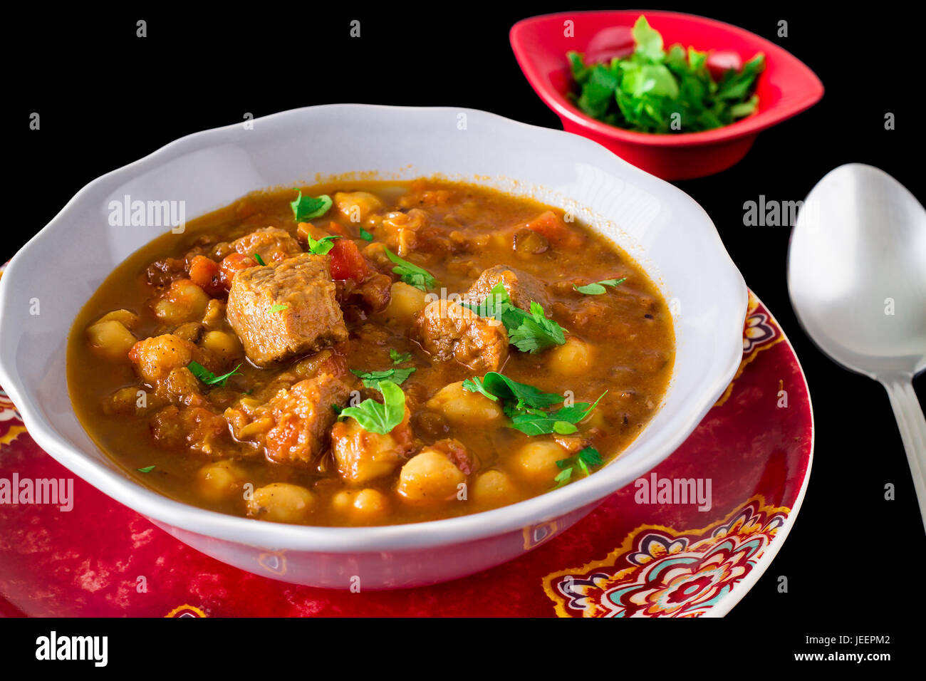 Famous Moroccan soup harira with meat, chickpeas, lentils, tomatoes and ...