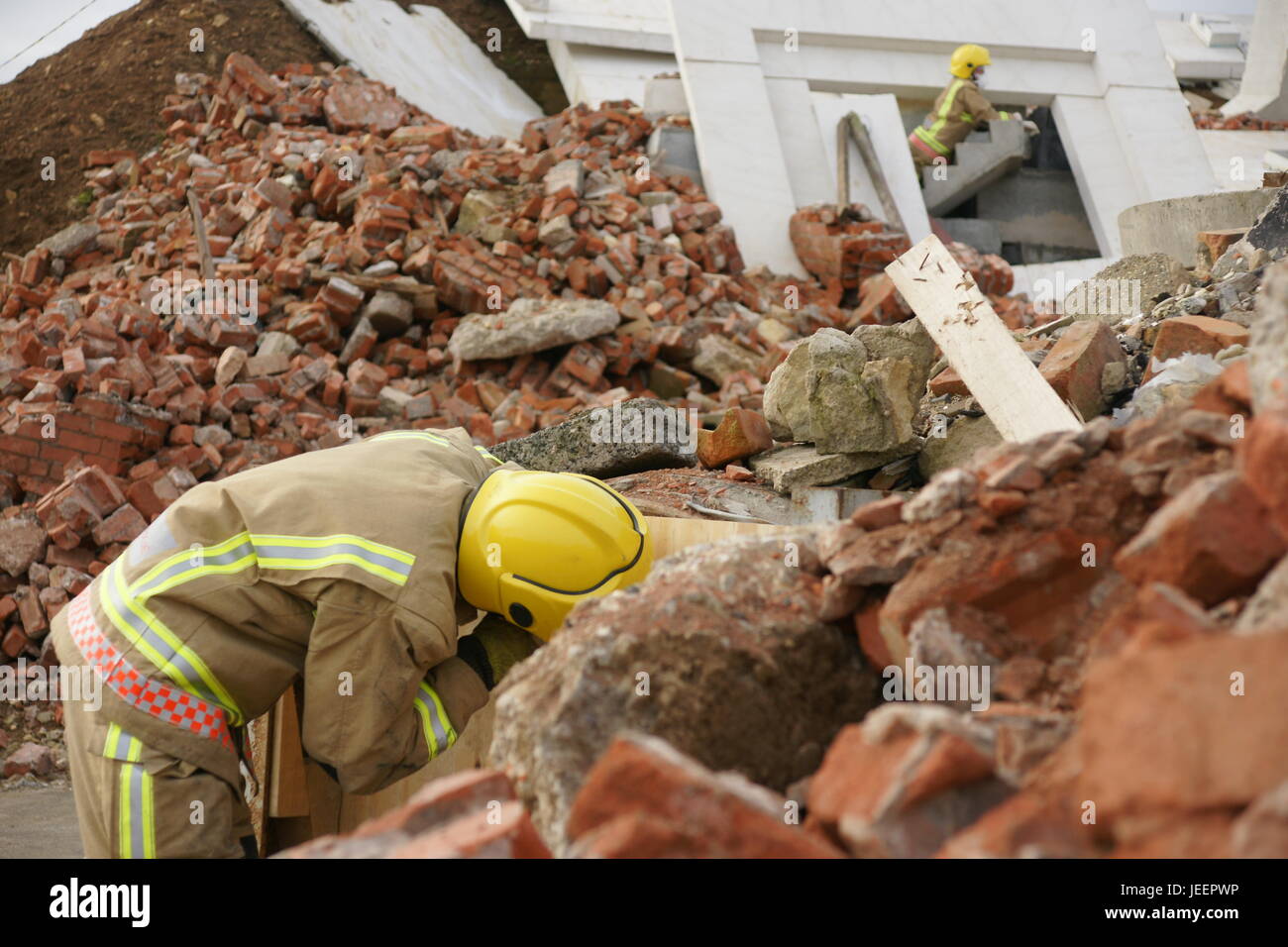 Rescue Team In Building Collapse High Resolution Stock Photography and ...