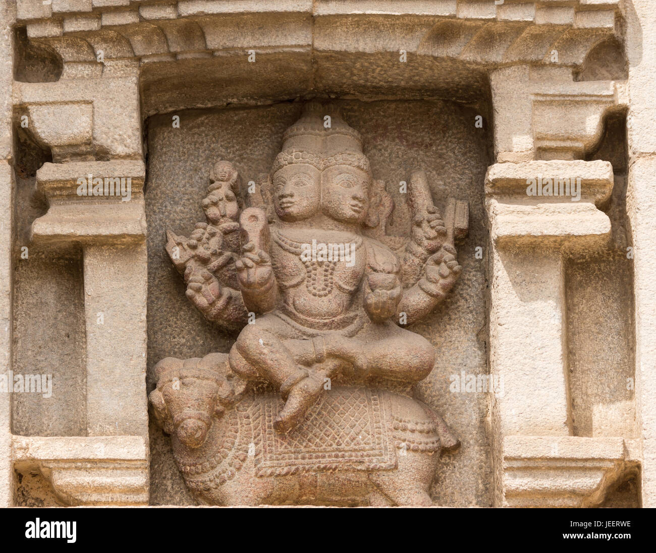 Nanjangud, India - October 26, 2013: Closeup of chiseled mural of multi ...