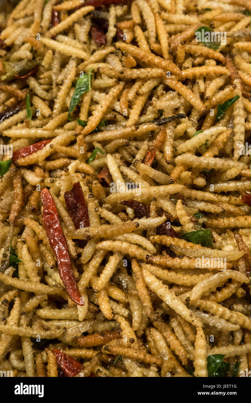 Deep fried caterpillars worms. Famous snack in Thailand Stock Photo - Alamy