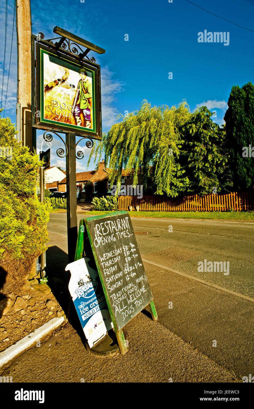 Dog and Gun pub sign, Knayton, North Yorkshire Stock Photo - Alamy