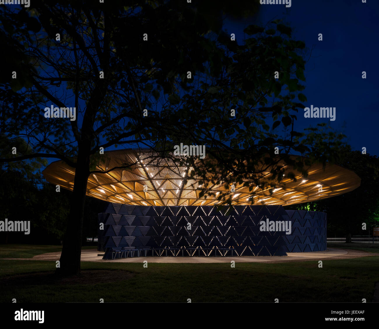 Night time view with tree and perimeter wall. Serpentine Summer ...