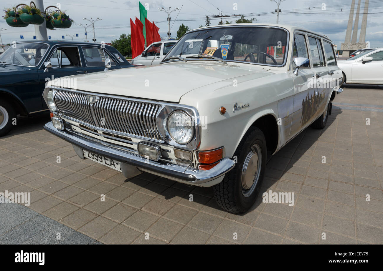 White GAZ M24 Volga at exibition of vintage cars. Summer. Belarus ...